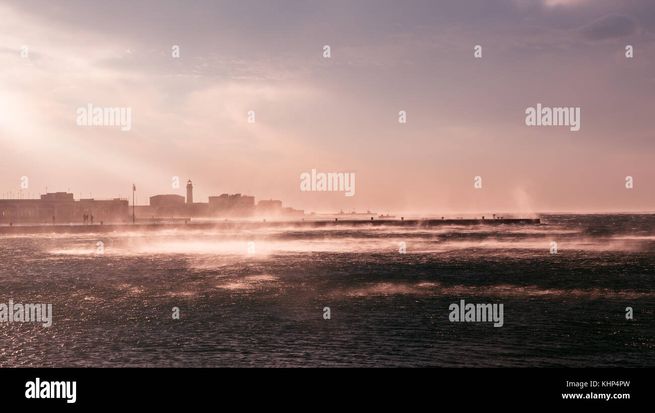 a cold and windy day in the port of Trieste, Italy Stock Photo - Alamy