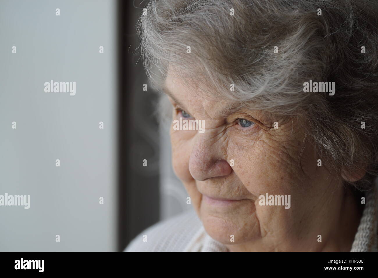 Portrait smiling mature elderly woman hi-res stock photography and ...