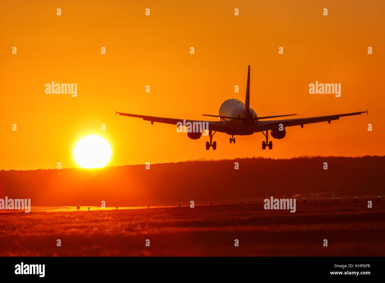 Plane Flying Into The Sun High Resolution Stock Photography and Images ...