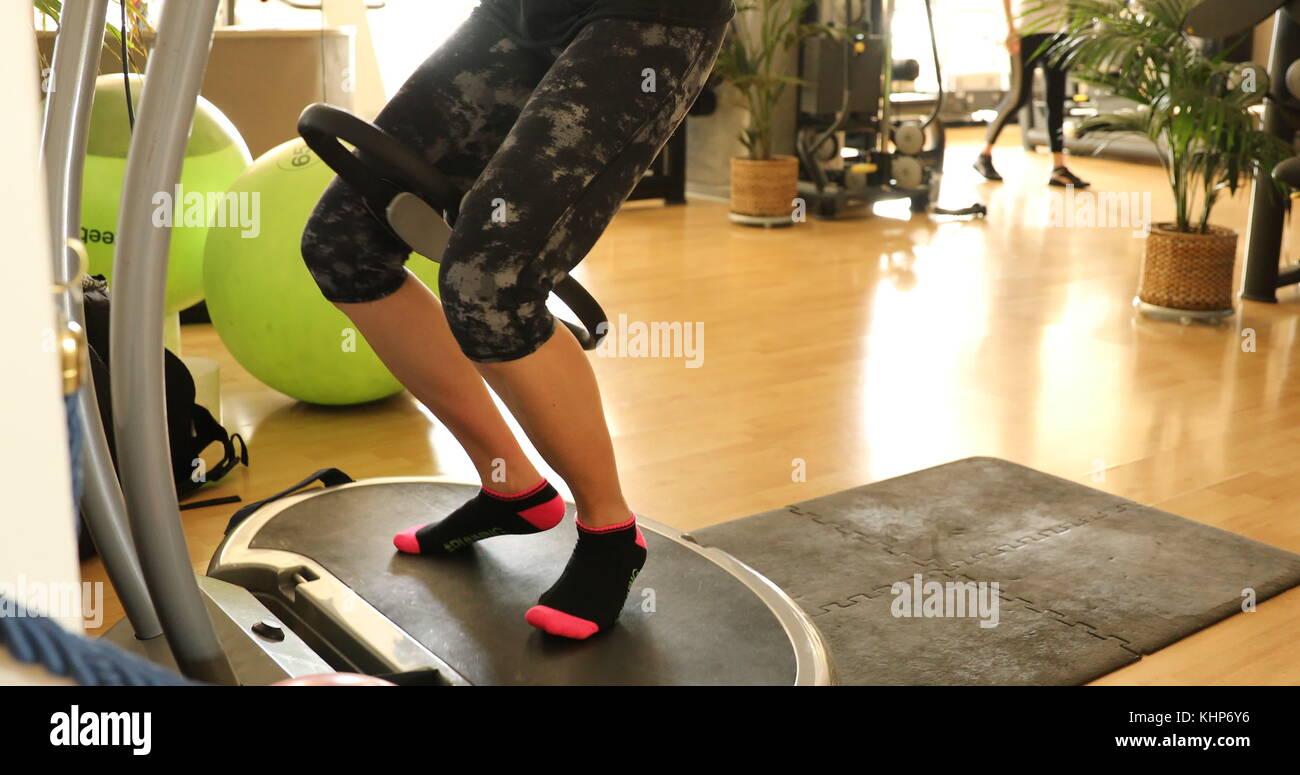 vibration plate leg toner Stock Photo - Alamy