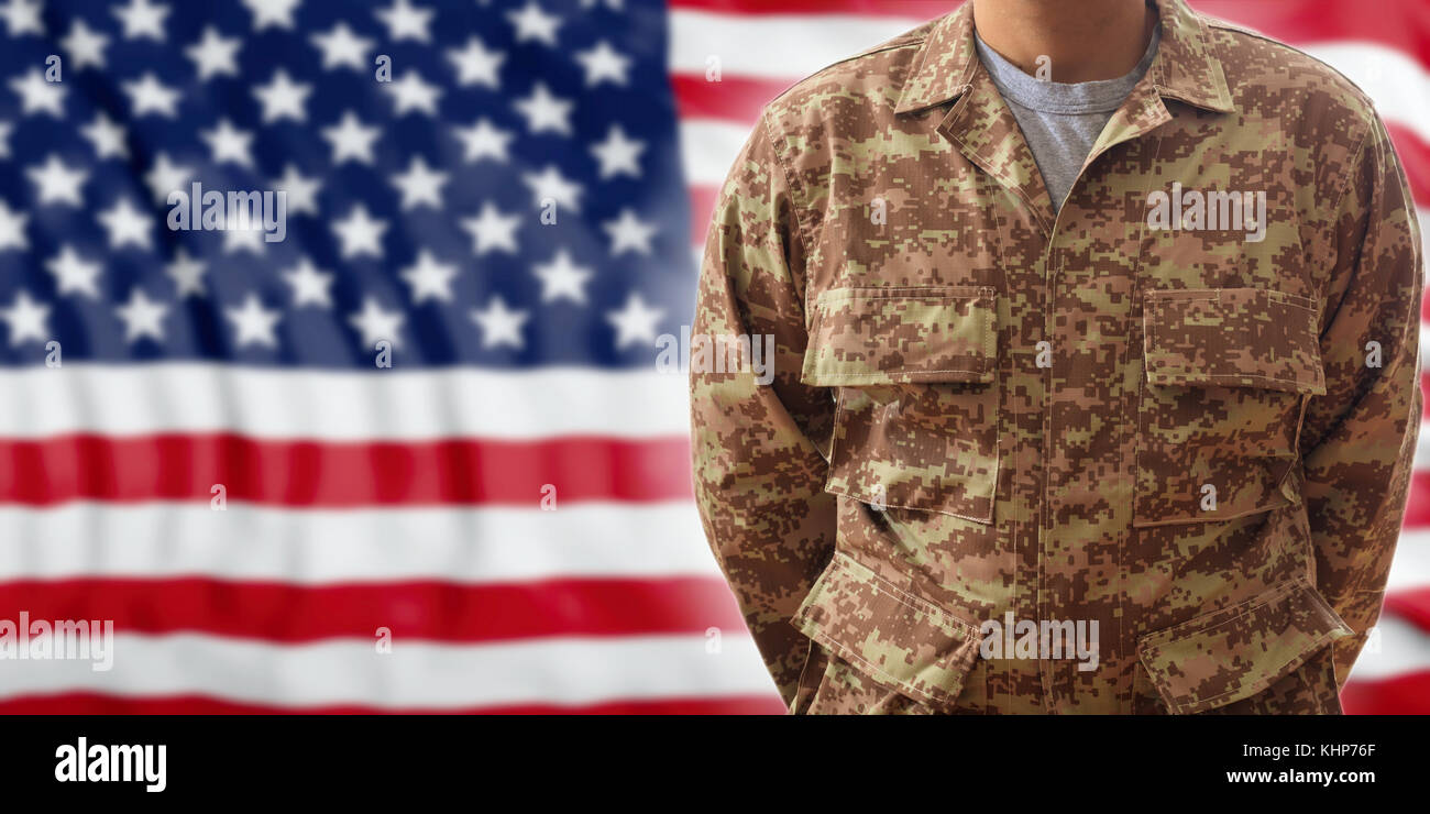 Soldier in a USA military digital pattern uniform, standing on an ...