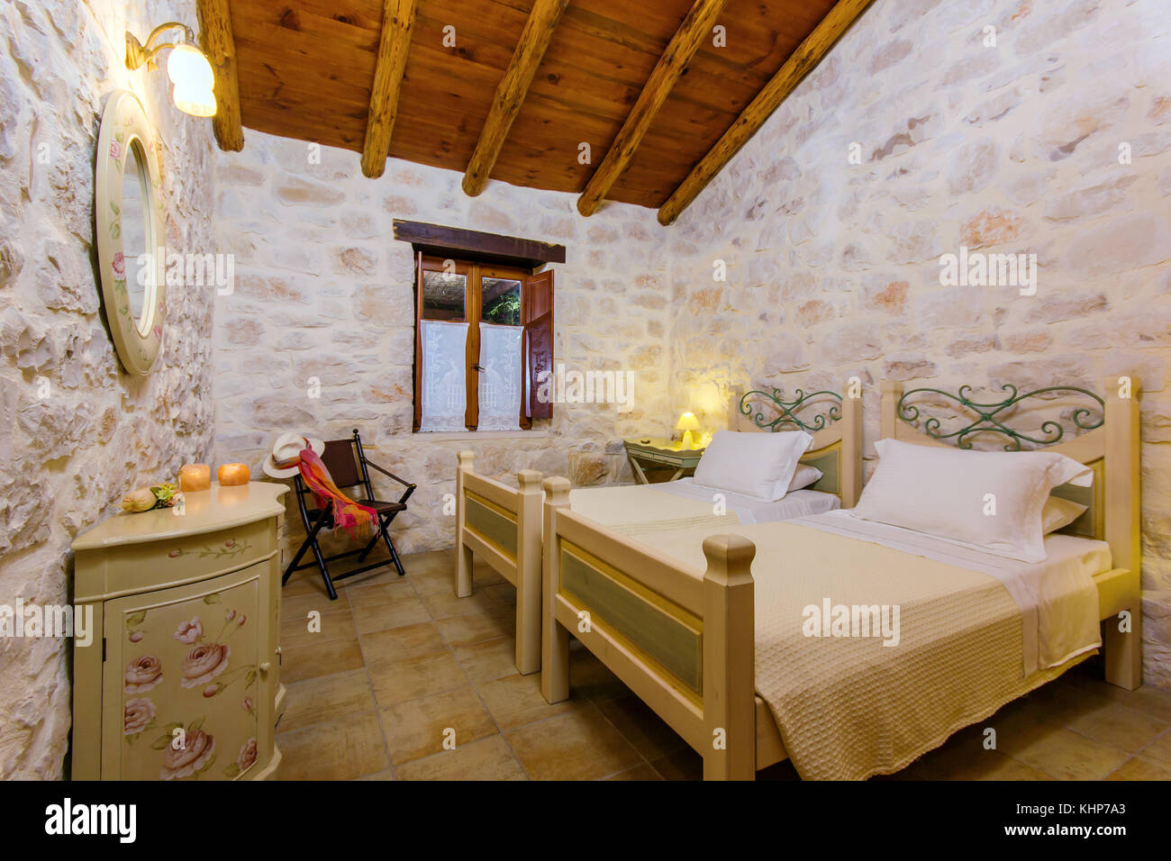 bedroom interior of a luxury traditional stone apartment Stock Photo ...