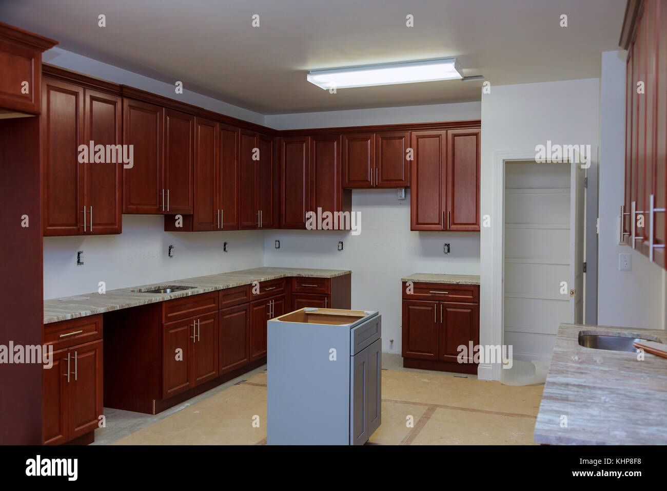 Modern wooden nice kitchen in home interior Stock Photo - Alamy