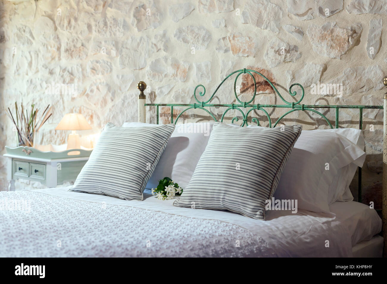 bedroom interior of a luxury traditional stone apartment Stock Photo ...