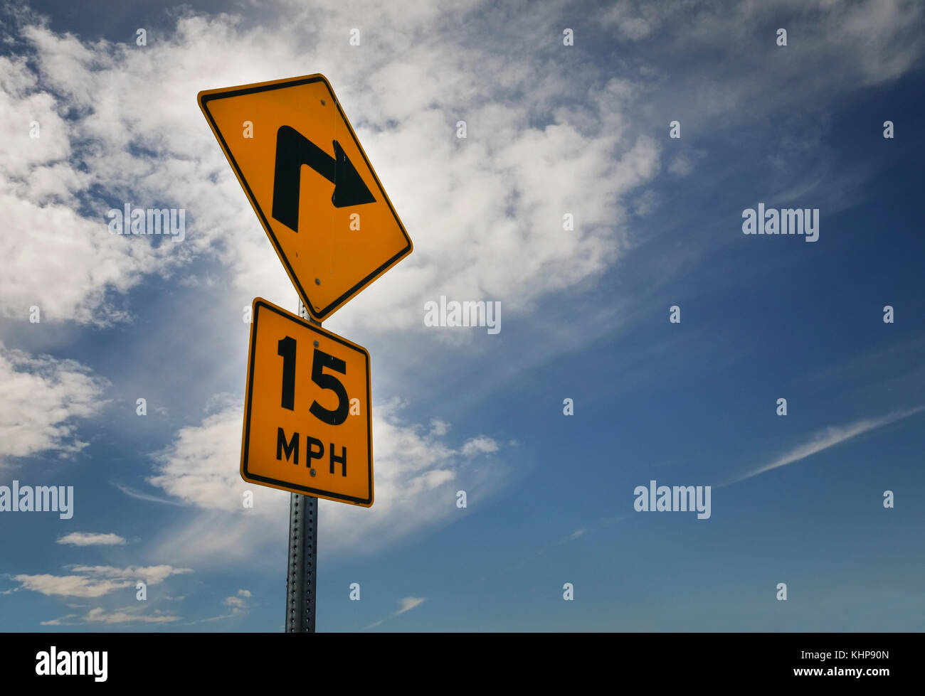 15 MPH speed limit roadsign against blue skies with white clouds Stock ...
