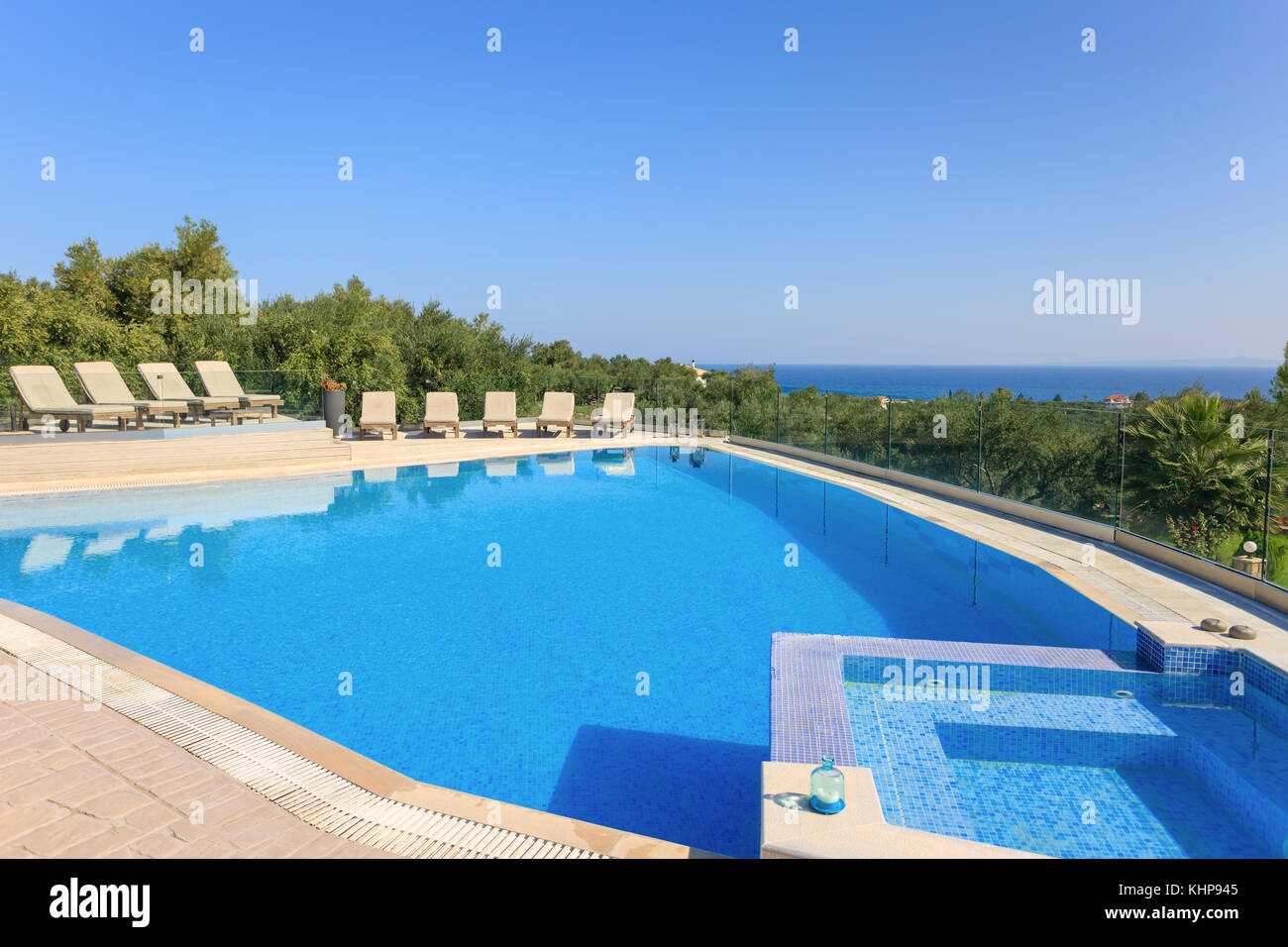 big luxury pool in a summer resort in Greece Stock Photo - Alamy