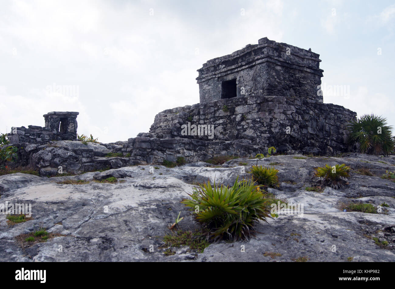 Smal stone temples on the rock in Tulum, Mexico Stock Photo - Alamy