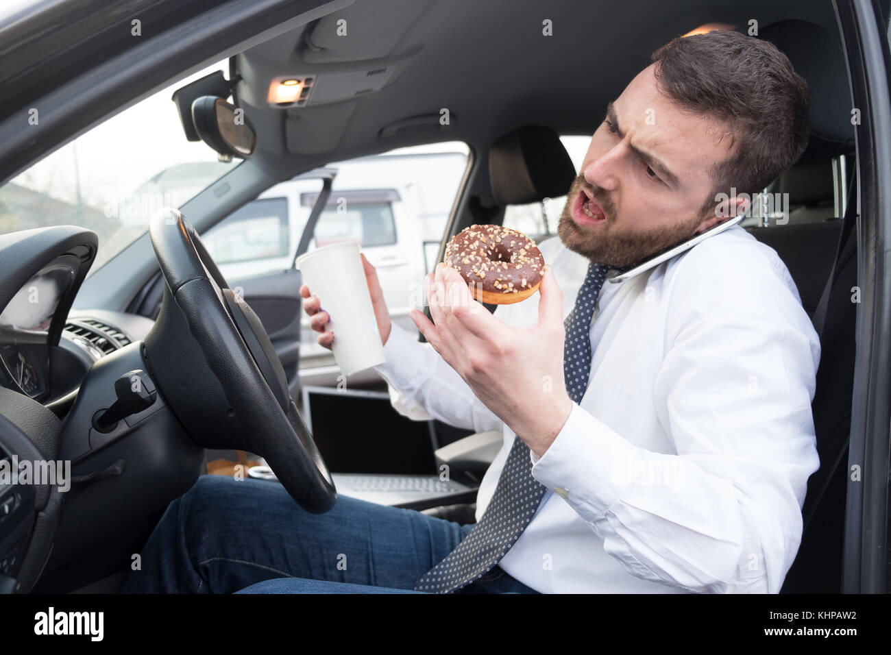 Male driving car queue hi-res stock photography and images - Alamy