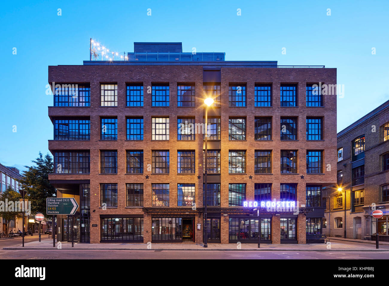 Exterior facade with Red Rooster restaurant signage. The Curtain Hotel ...