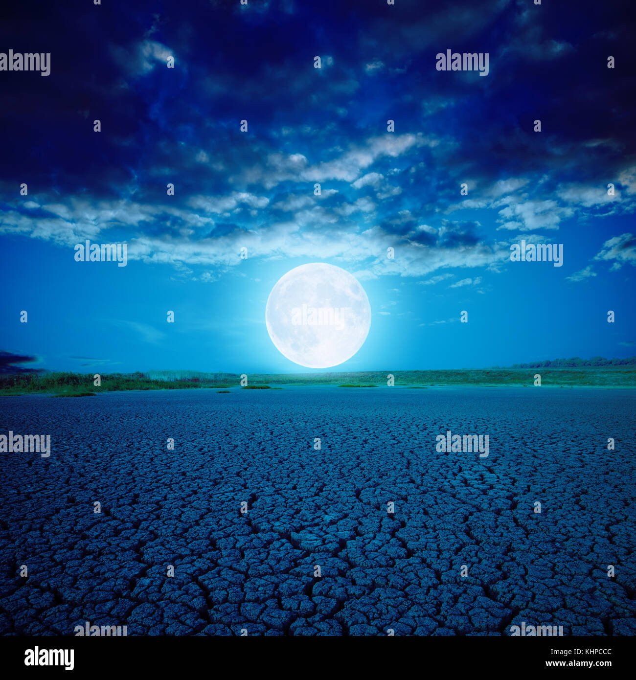 full moon over desert in night Stock Photo - Alamy