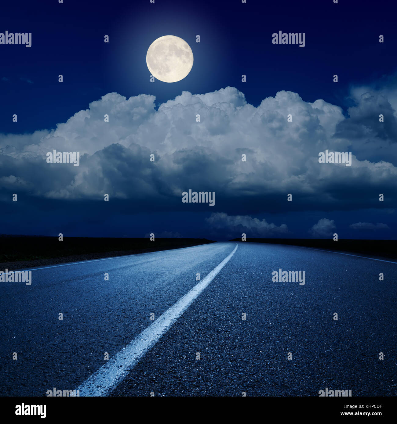 full moon over clouds and asphalt road Stock Photo - Alamy