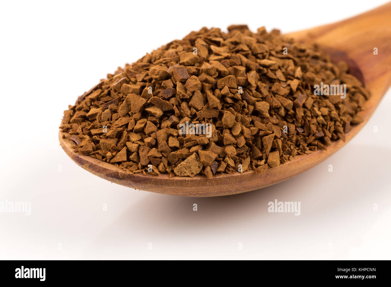 Heap of instant coffee in spoon isolated on white background Stock ...