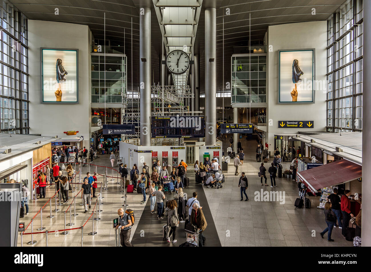 Travelers in the busy Copenhagen airport terminal, Copenhagen - May 17 ...