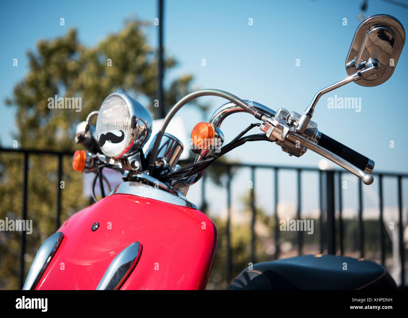 red moped on the street Stock Photo - Alamy
