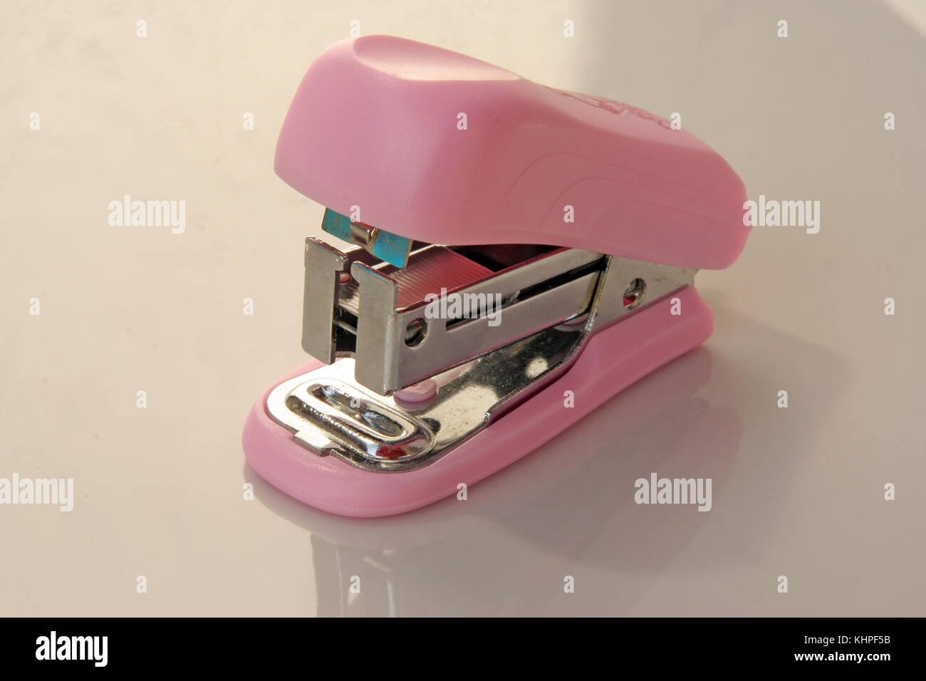 Pink stapler hi-res stock photography and images - Alamy