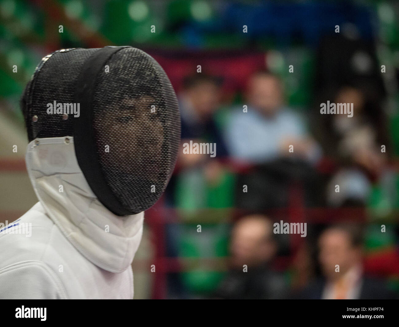 fencer wearing a mask during a sporting event Stock Photo - Alamy