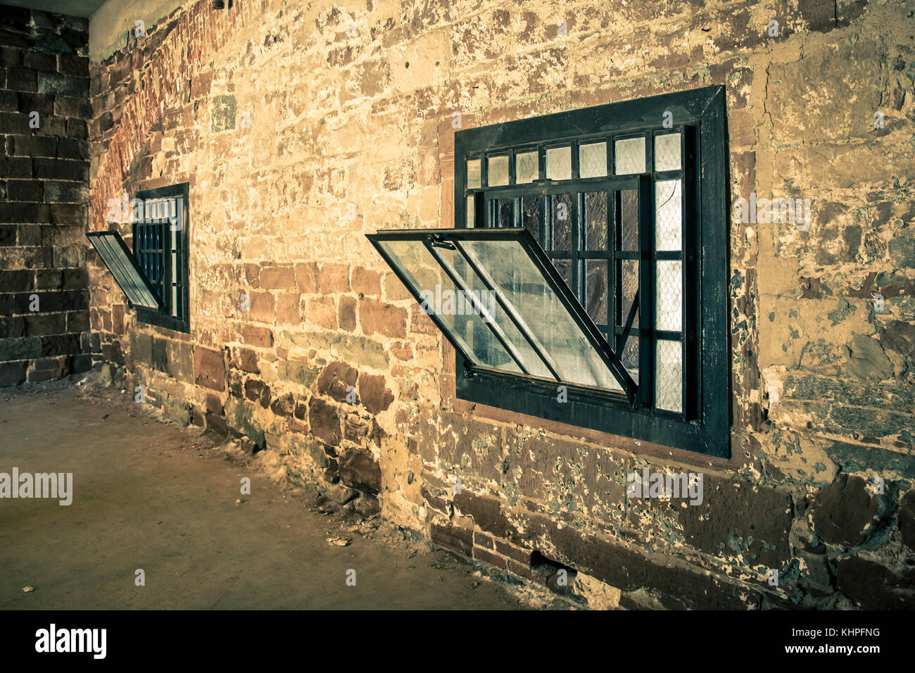 Rough stone interior wall with grunge window Stock Photo - Alamy