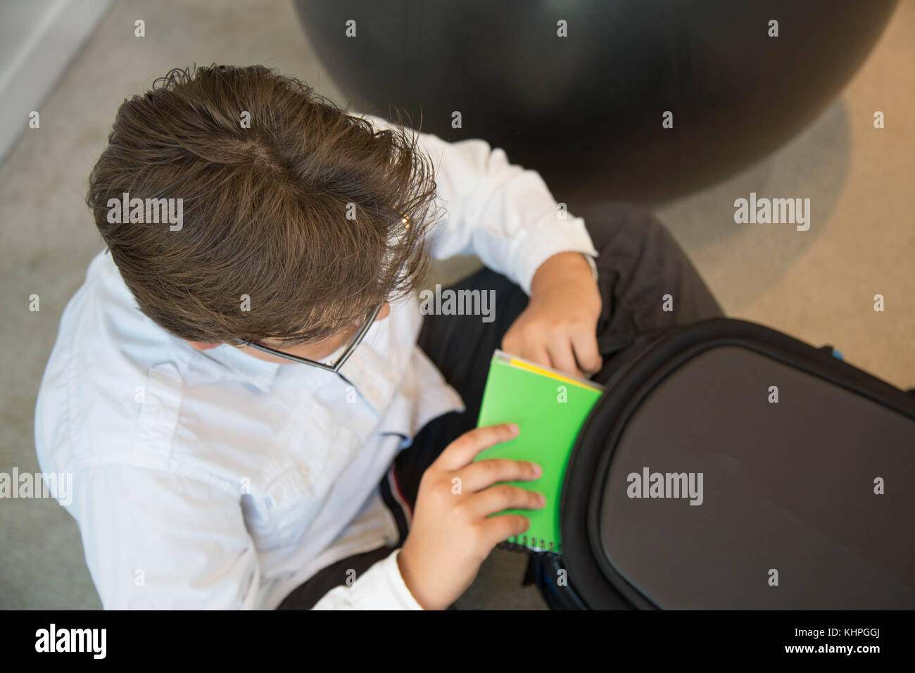 Teenager getting ready school background white short Stock Photo - Alamy
