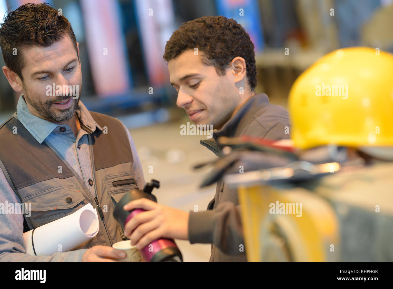 factory construction designer showing sample products Stock Photo - Alamy