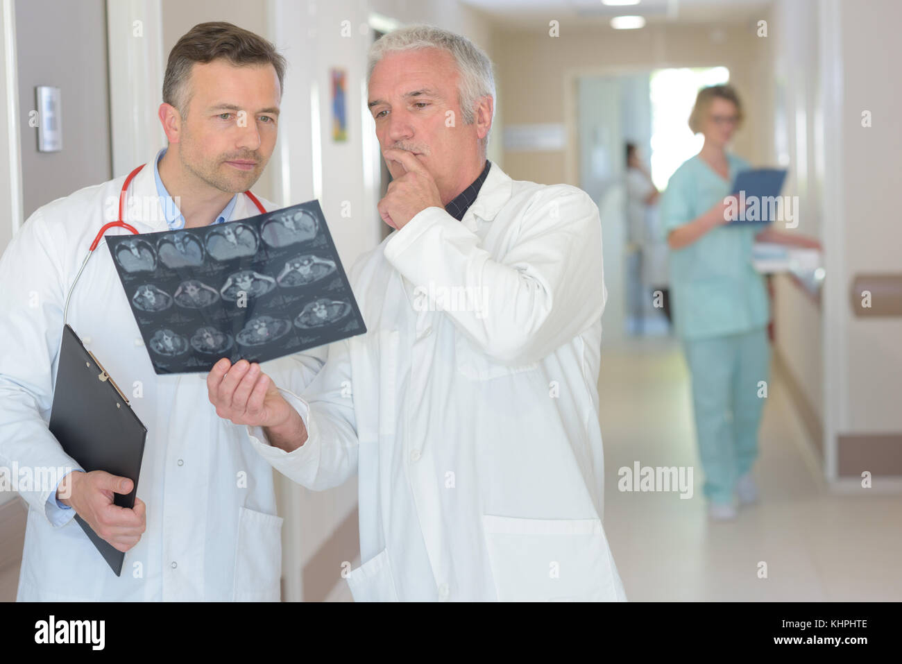 radiologists looking at x-ray in the hospital corridor Stock Photo - Alamy