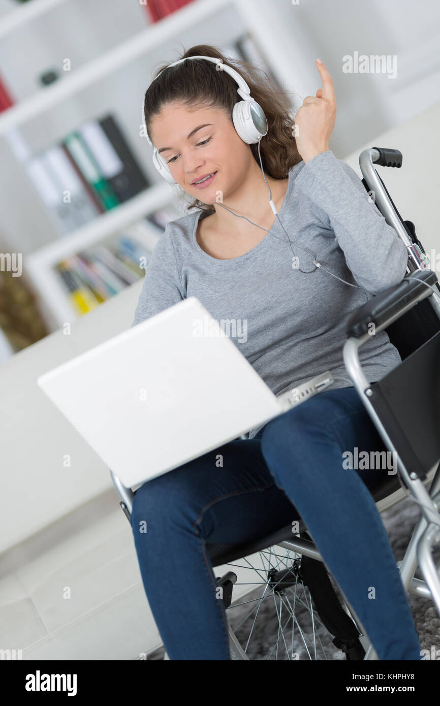 disabled woman in wheelchair with laptop Stock Photo - Alamy