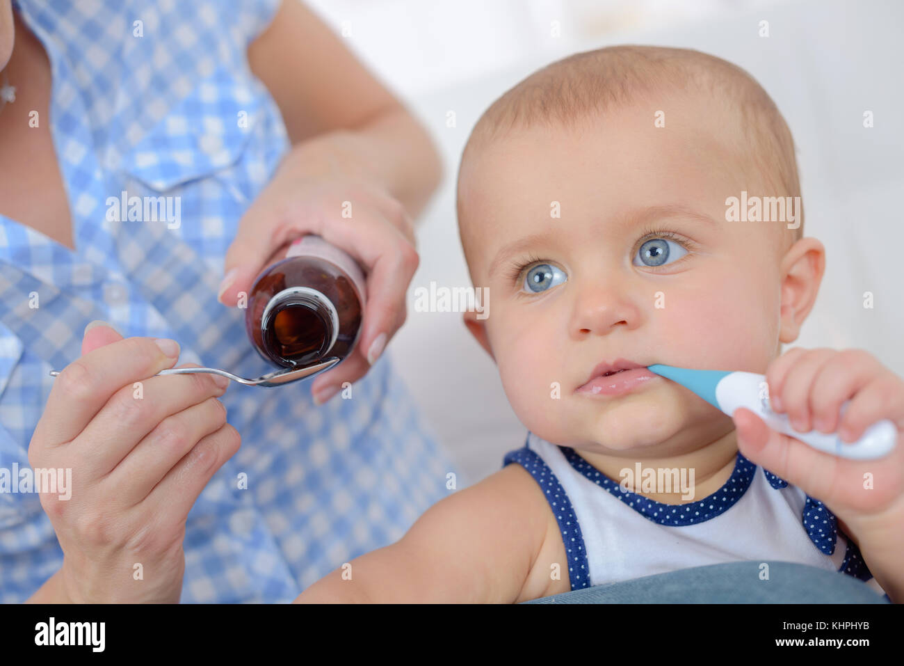giving vitamins to the baby Stock Photo - Alamy