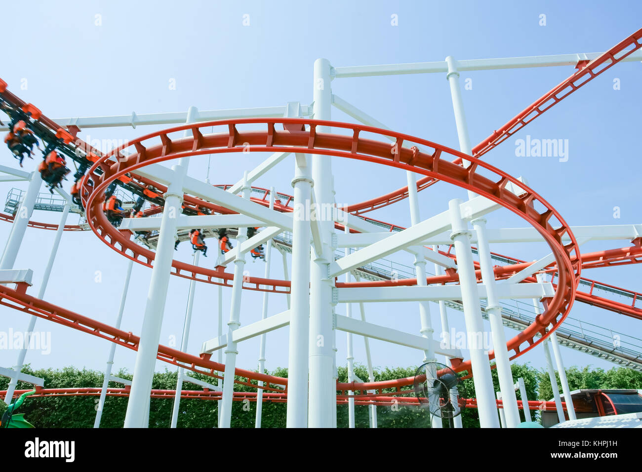 Funny with Roller Coaster in amusement park, so excited Stock Photo - Alamy