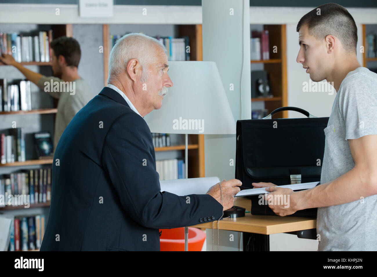 Older student in class hi-res stock photography and images - Alamy
