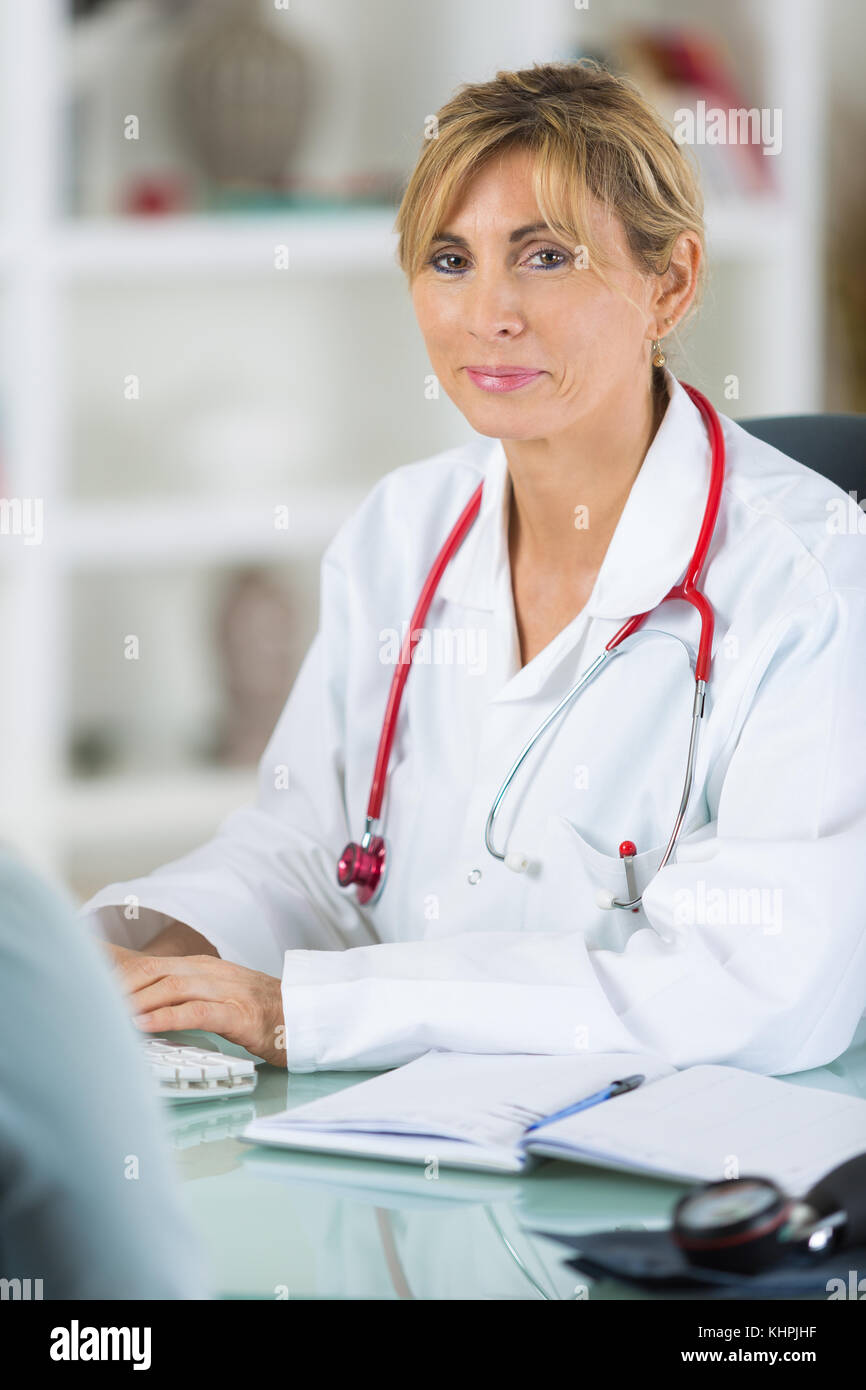 Pensive middle aged doctor hi-res stock photography and images - Alamy