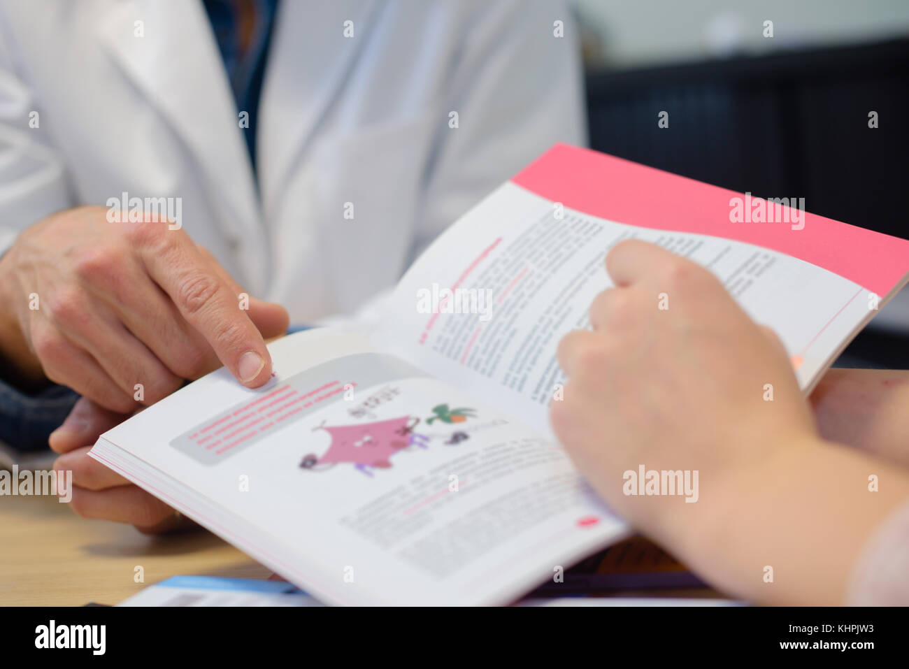 Reading pamphlet hi-res stock photography and images - Alamy