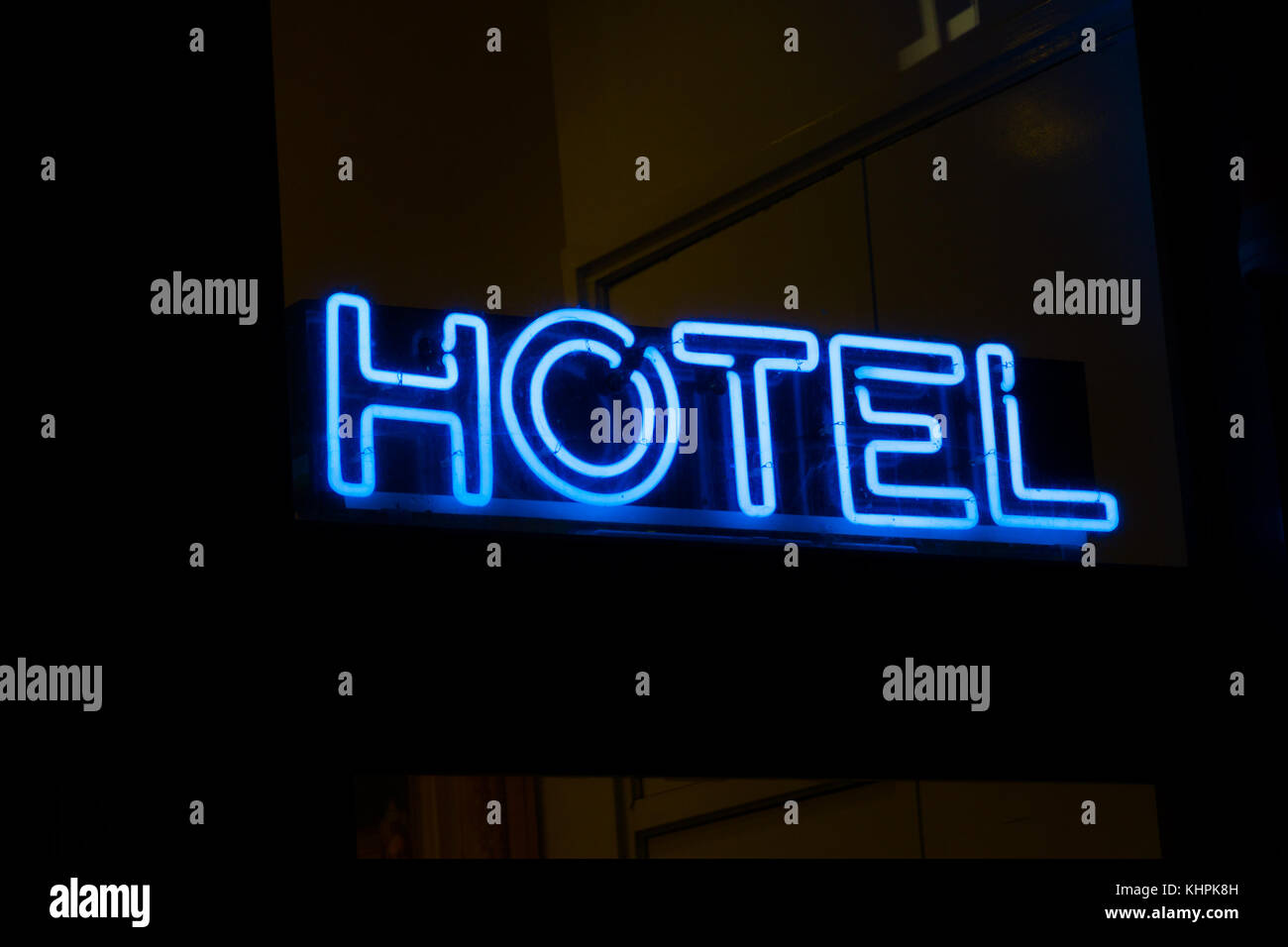 Hotel neon sign at the street Stock Photo - Alamy