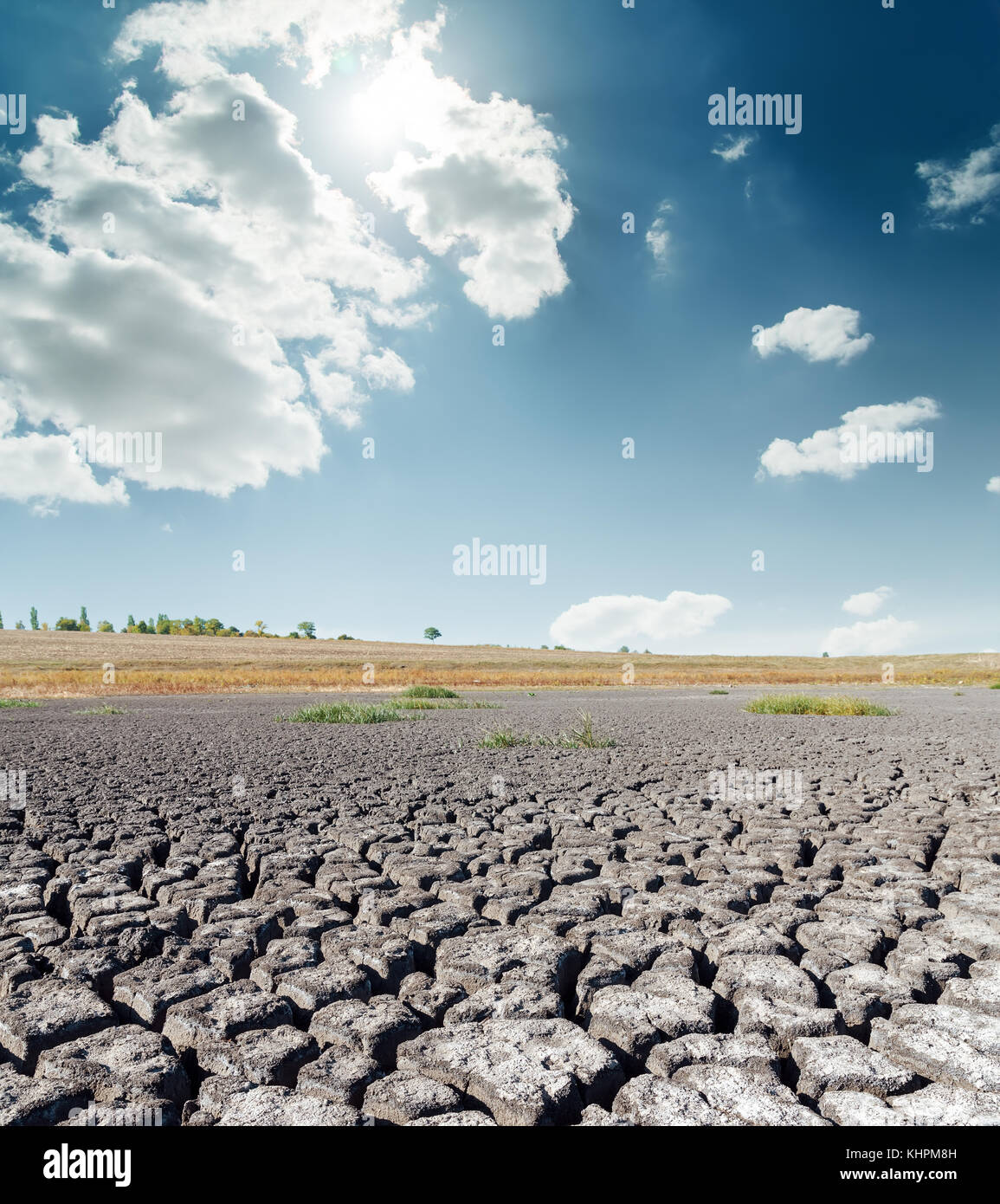 dramatic sky with sun over desert Stock Photo - Alamy