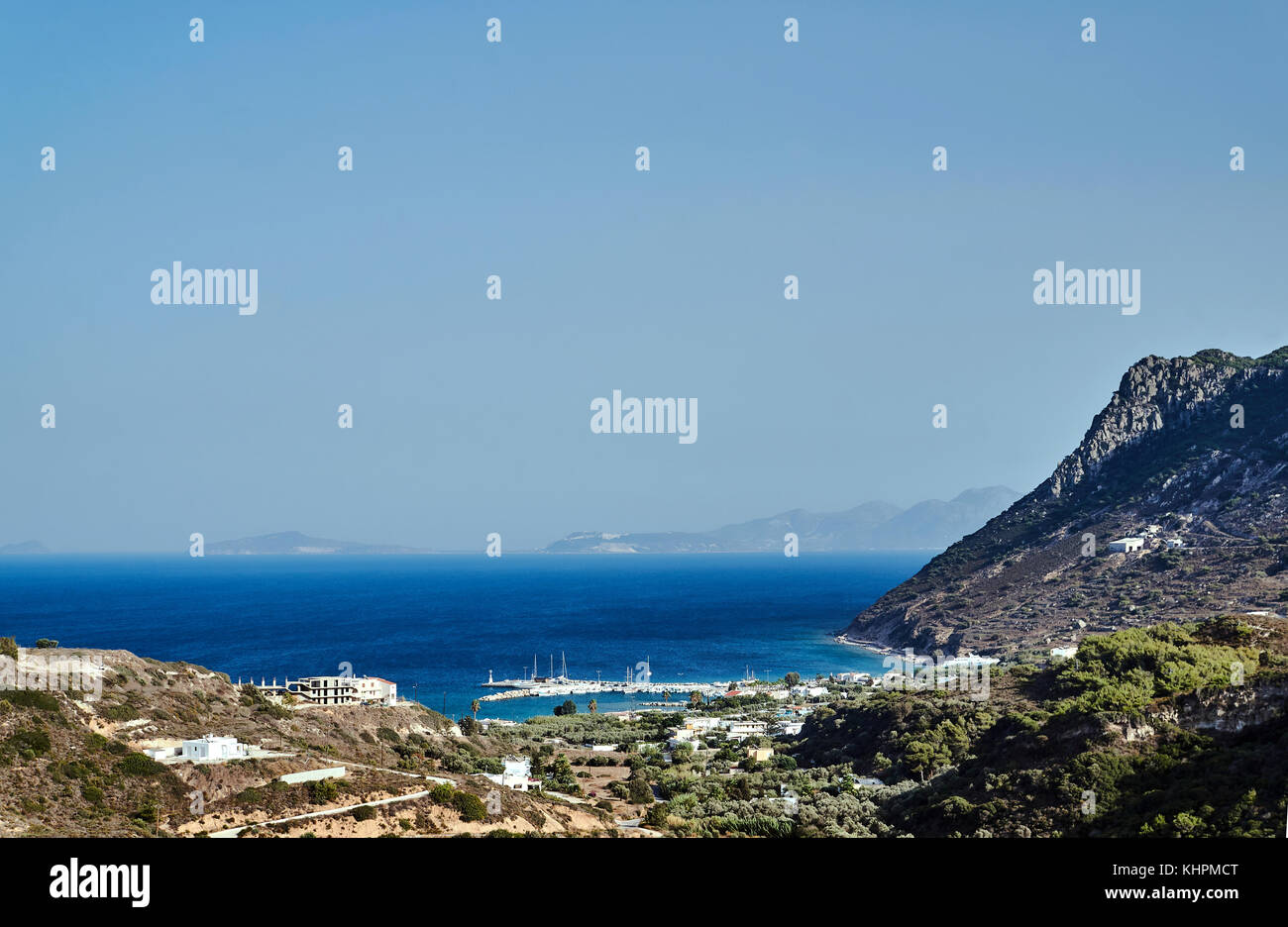 Bay and the rocky coast of the Aegean Sea island of Kos Stock Photo - Alamy