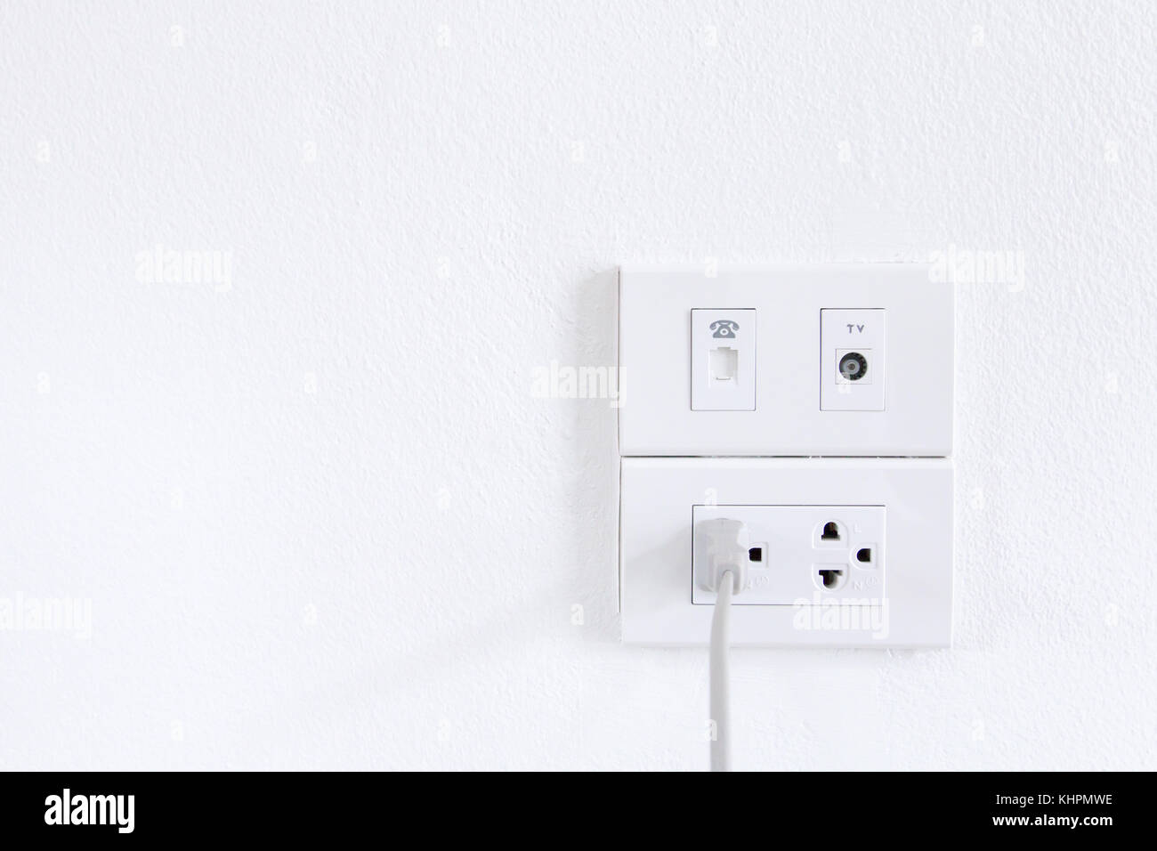 White electric plugs on wall background,White outlet interior, interior ...