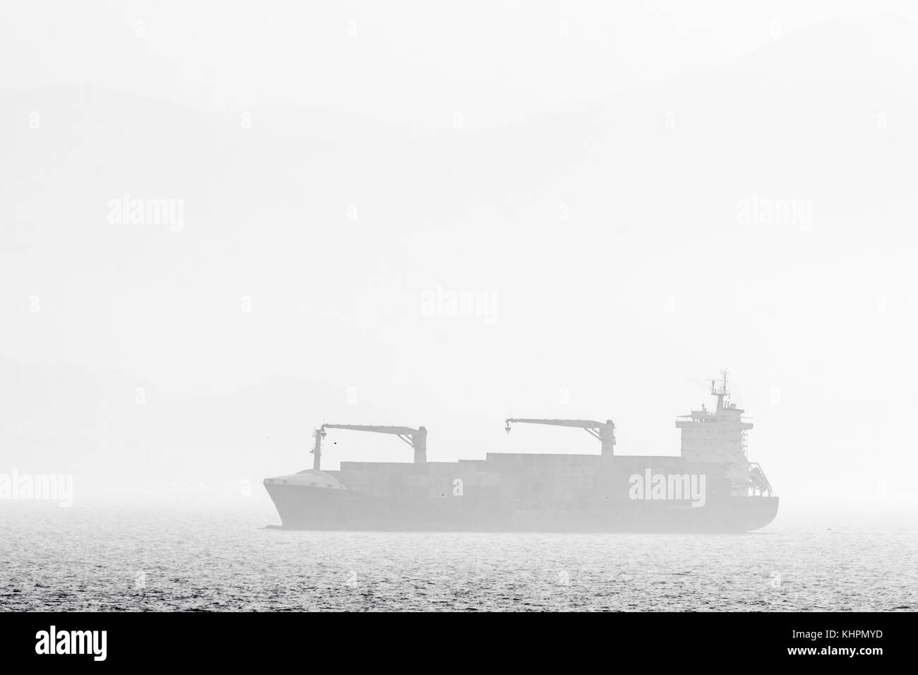 Ship on the foggy sea Stock Photo - Alamy