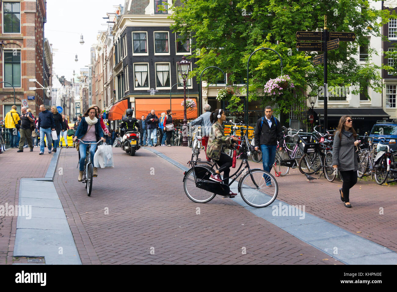 People move around the city by bike Stock Photo - Alamy