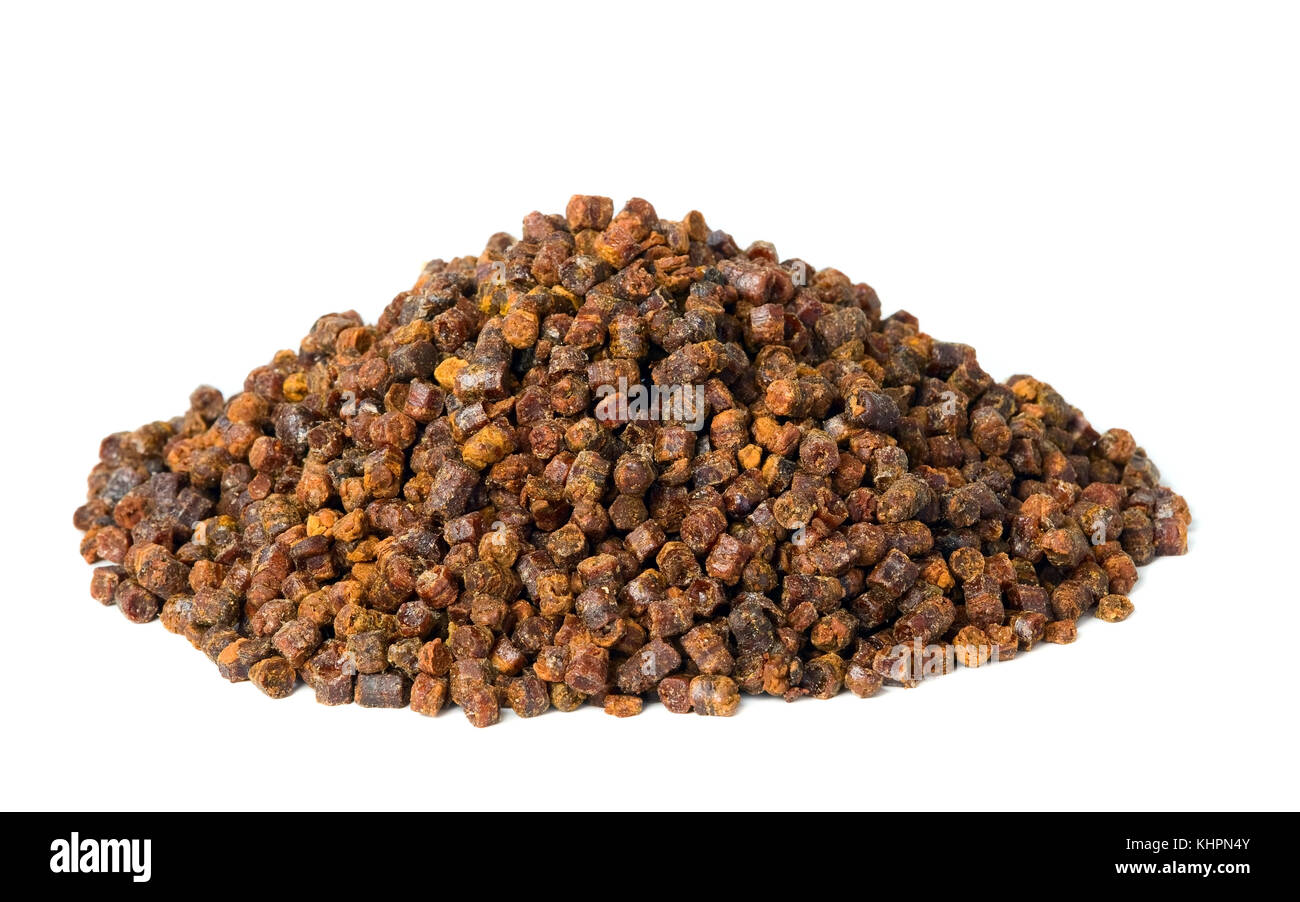 Propolis granules isolated on white background, bee product Stock Photo ...