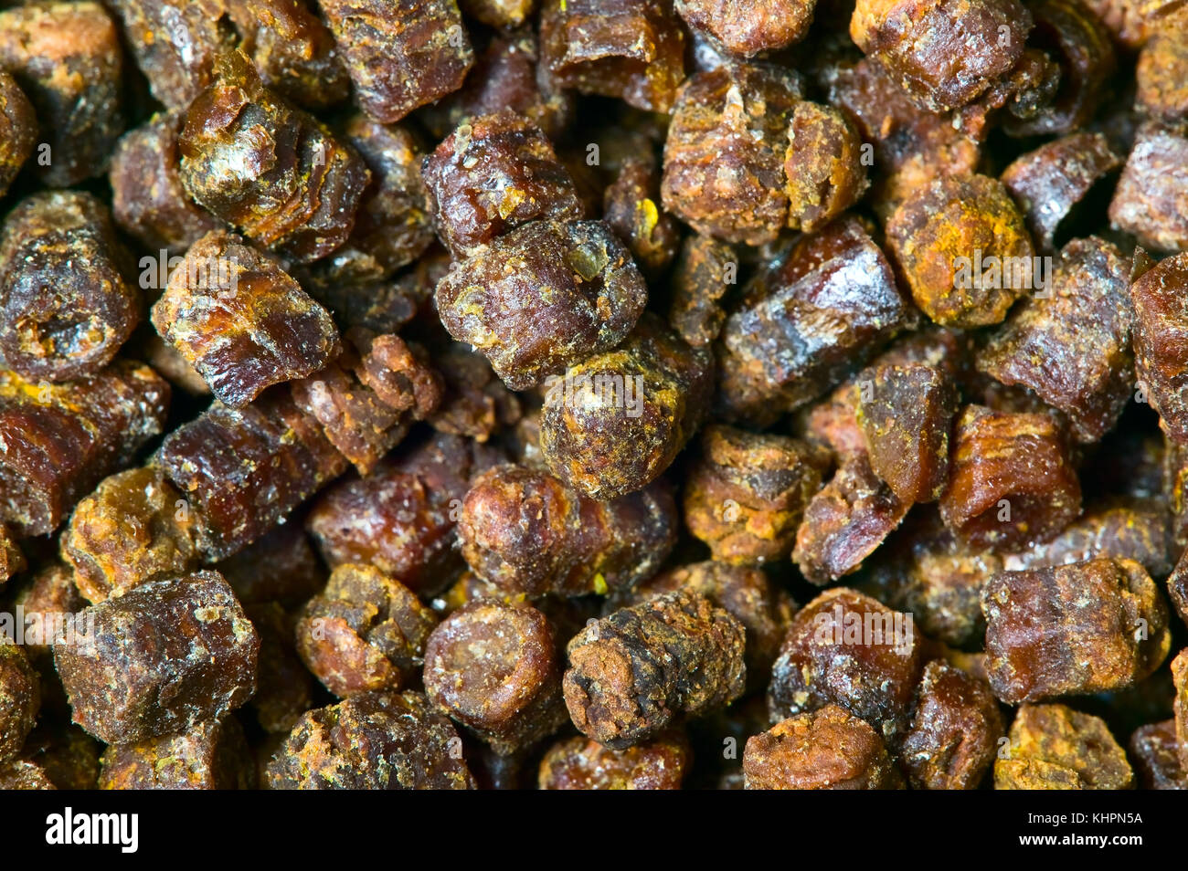 Propolis granules grunge texture background, bee product Stock Photo ...