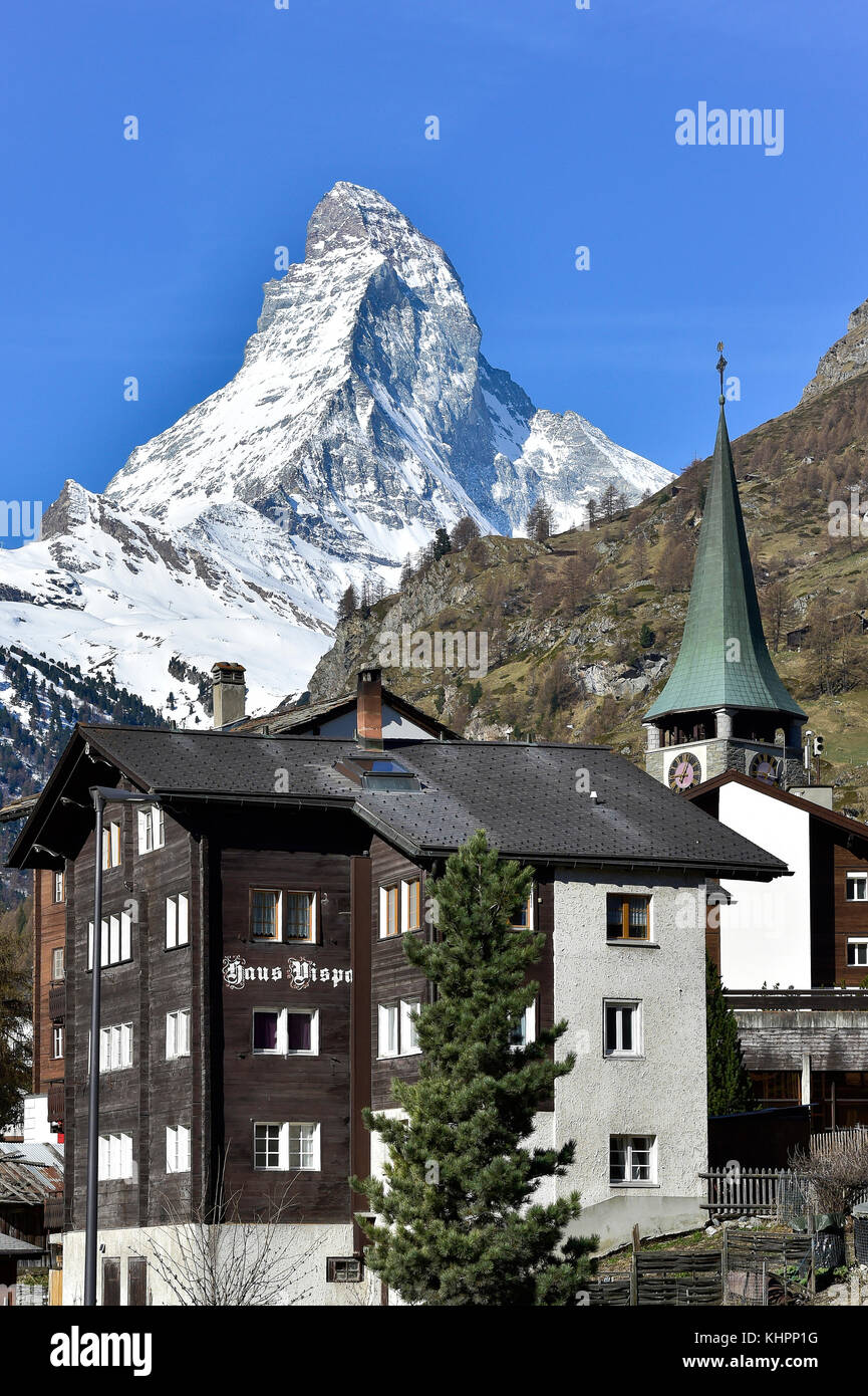Snow-covered Matterhorn, village with parish church, St. Mauritius ...