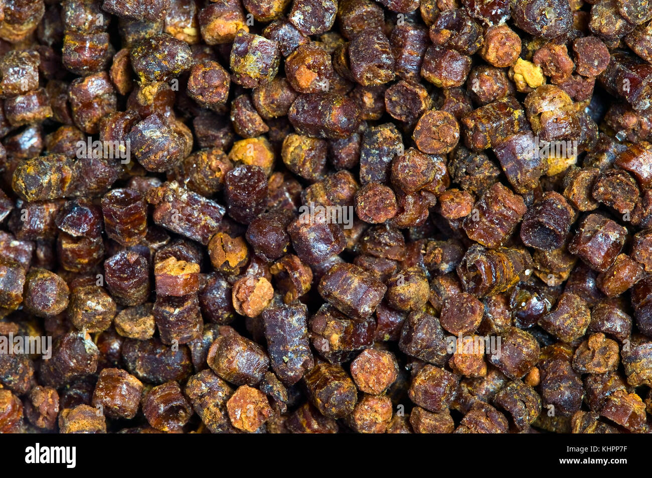 Propolis granules grunge texture background, bee product Stock Photo ...