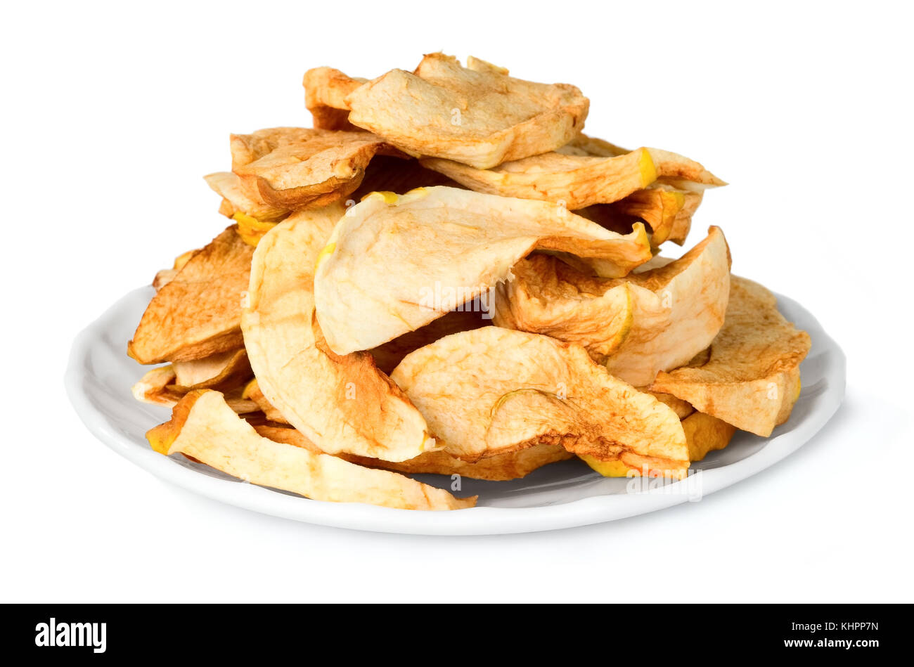 Sliced dry apples for snacks on white background Stock Photo - Alamy