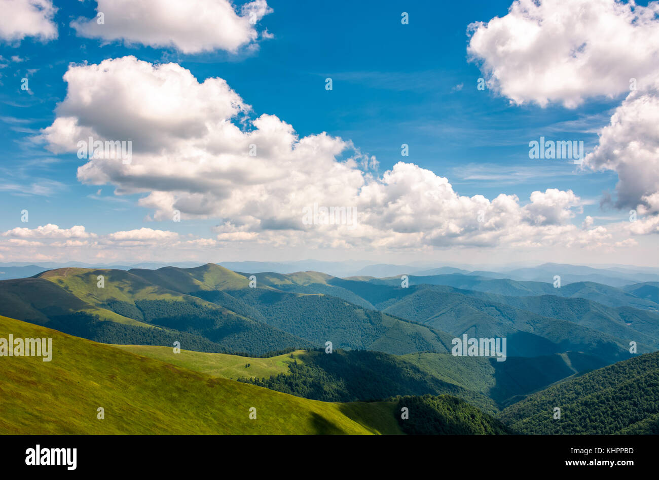 Carpathian mountain ridge with its spurs under sky with clouds ...