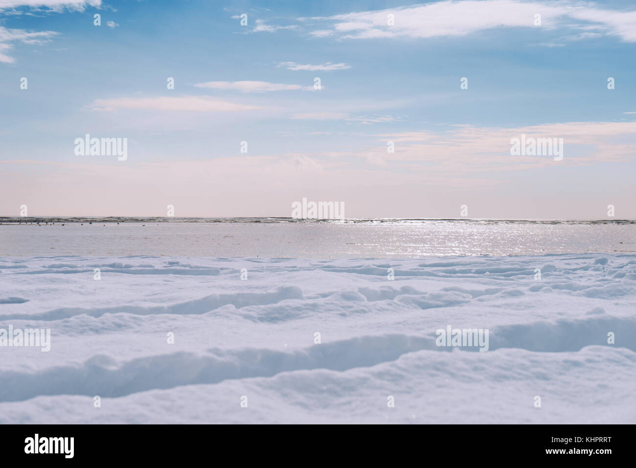 Snowy landscape by the sea Stock Photo - Alamy