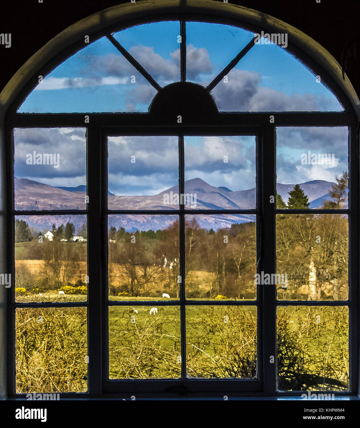 Mountains through the window Stock Photo - Alamy