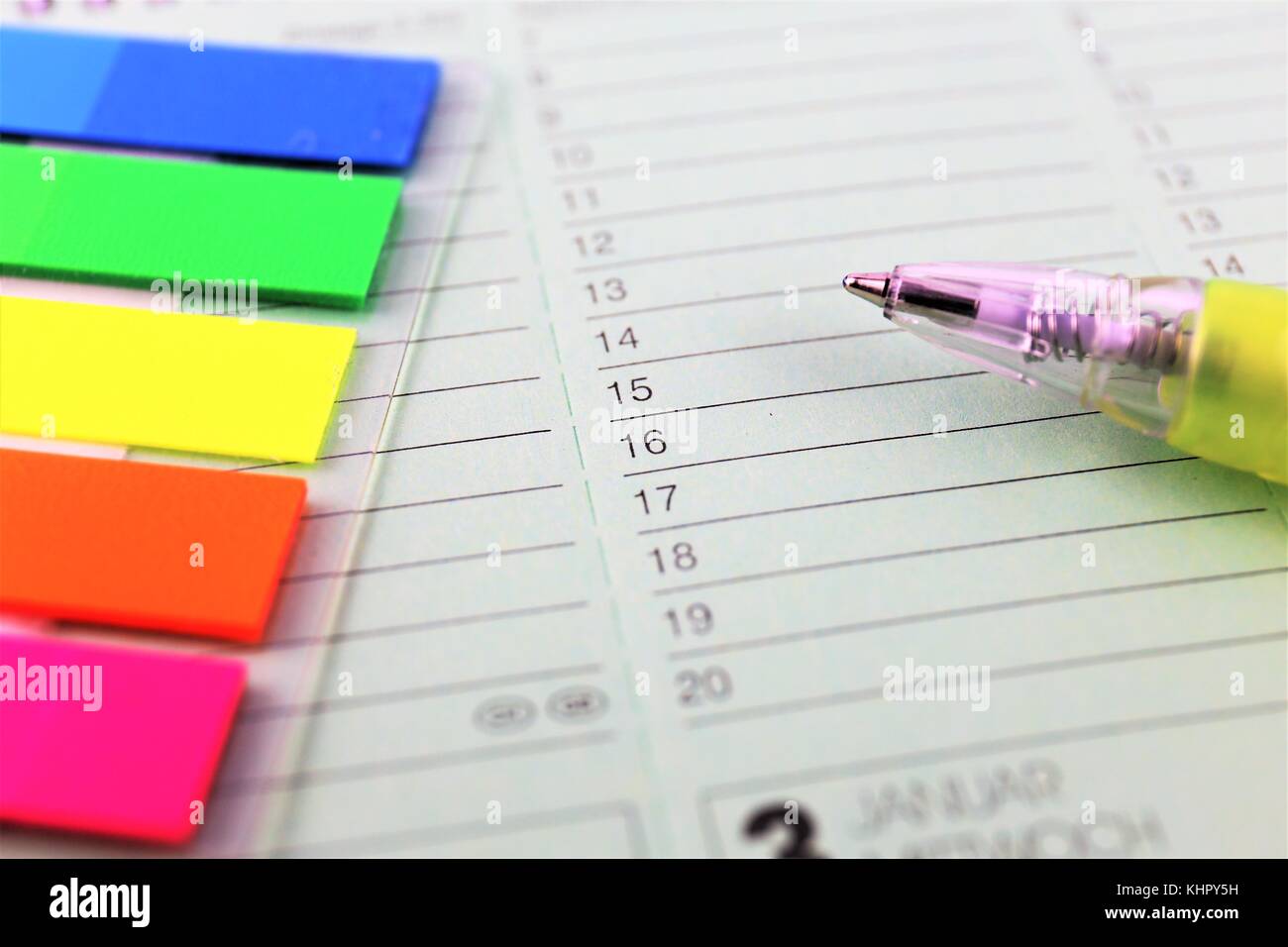 An colorful concept Image of a calendar with a pen Stock Photo - Alamy