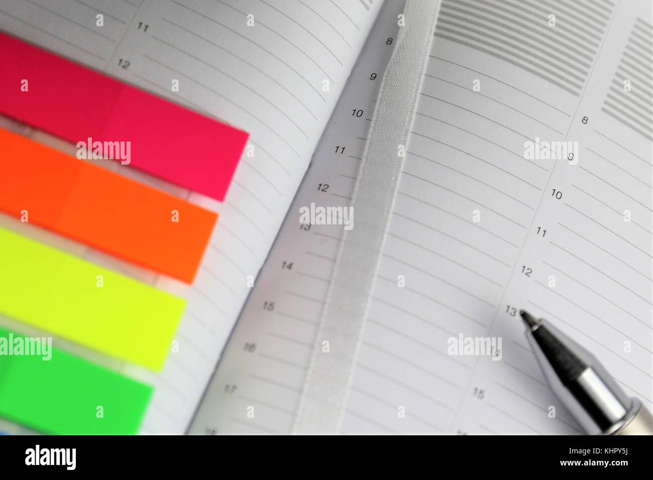 An colorful concept Image of a calendar with a pen Stock Photo - Alamy