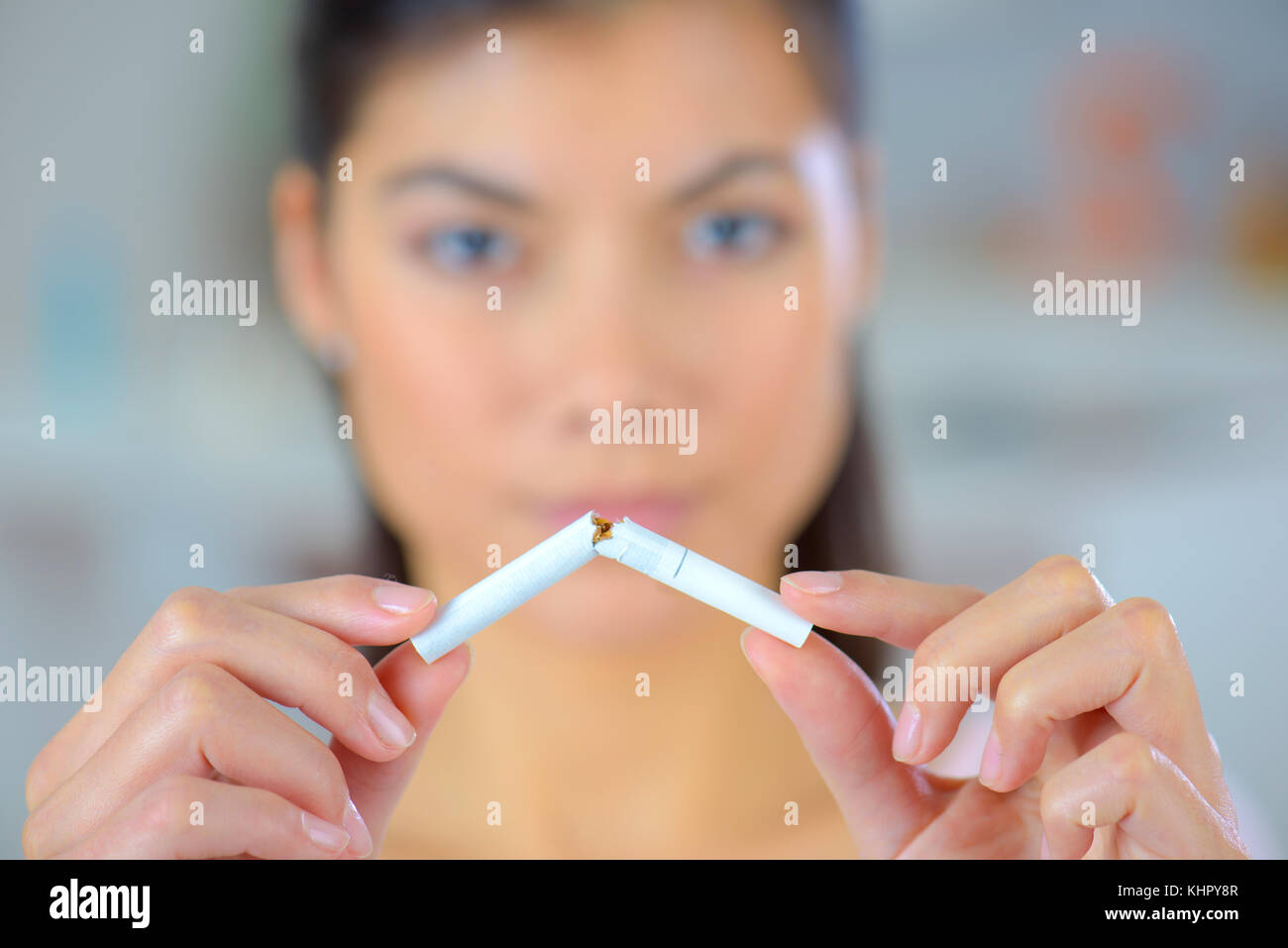 Woman trying to quit smoking Stock Photo - Alamy