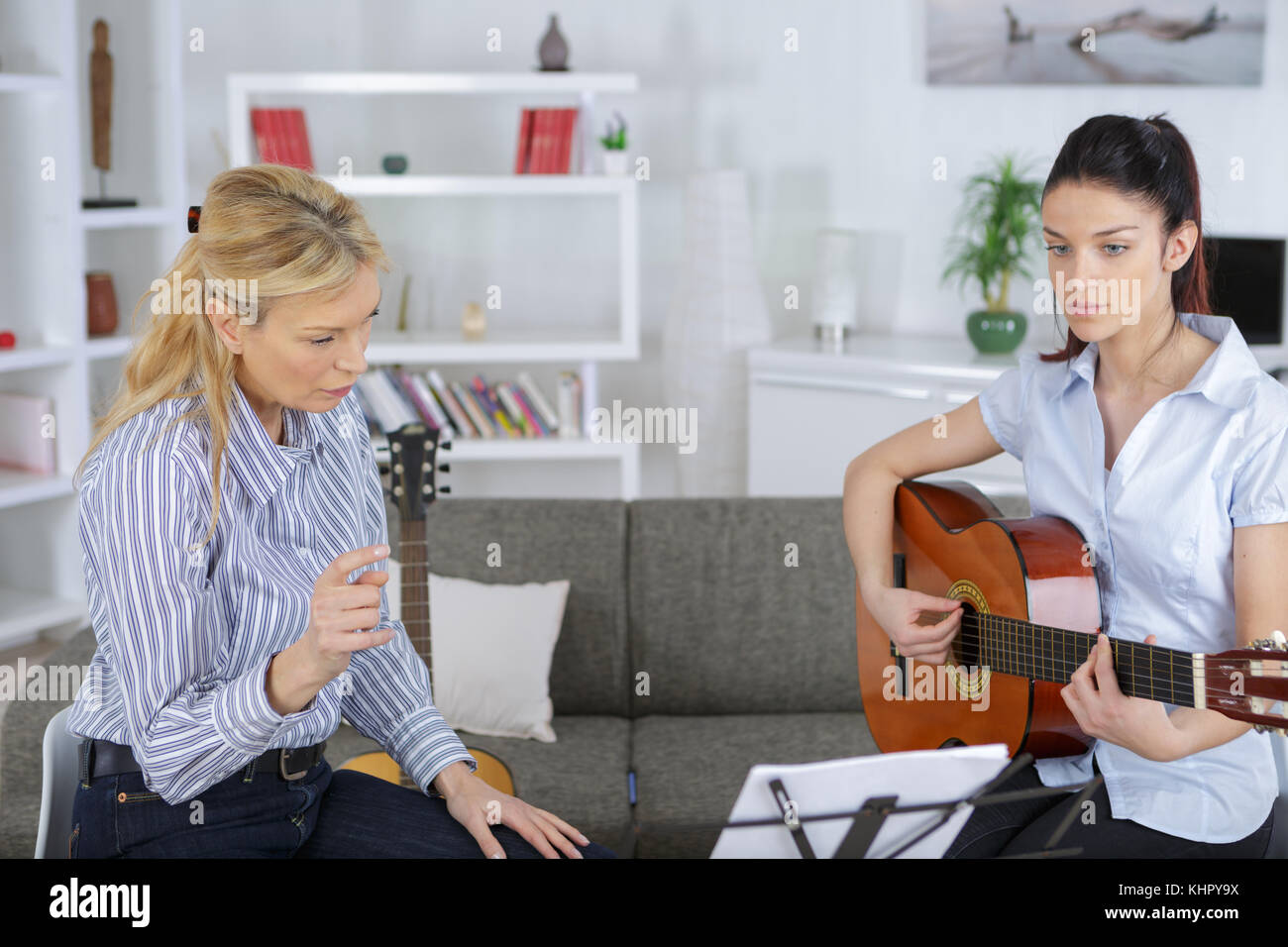 cheerful young teen musician playing guitar Stock Photo - Alamy