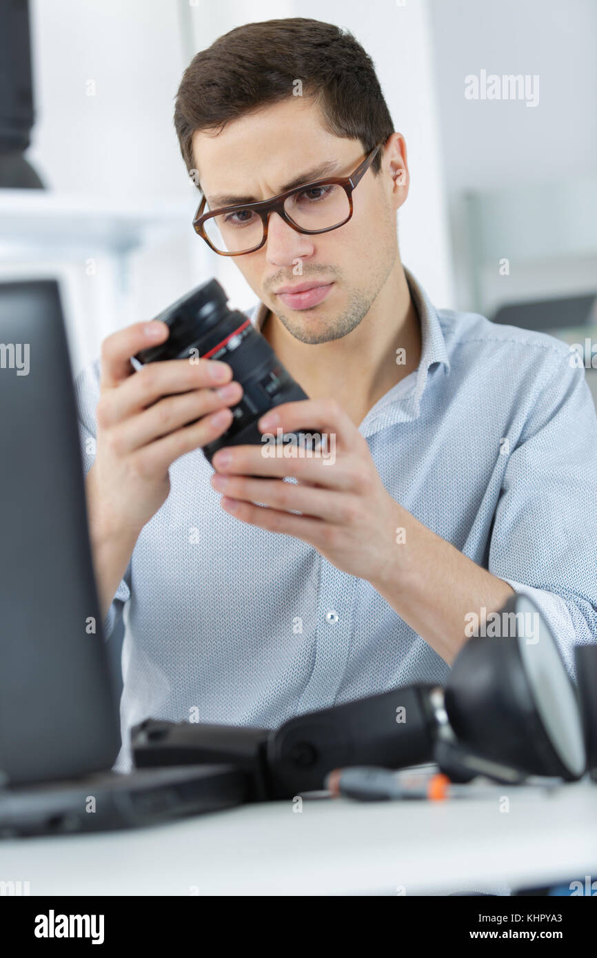 asian handsome man looks at lens Stock Photo - Alamy