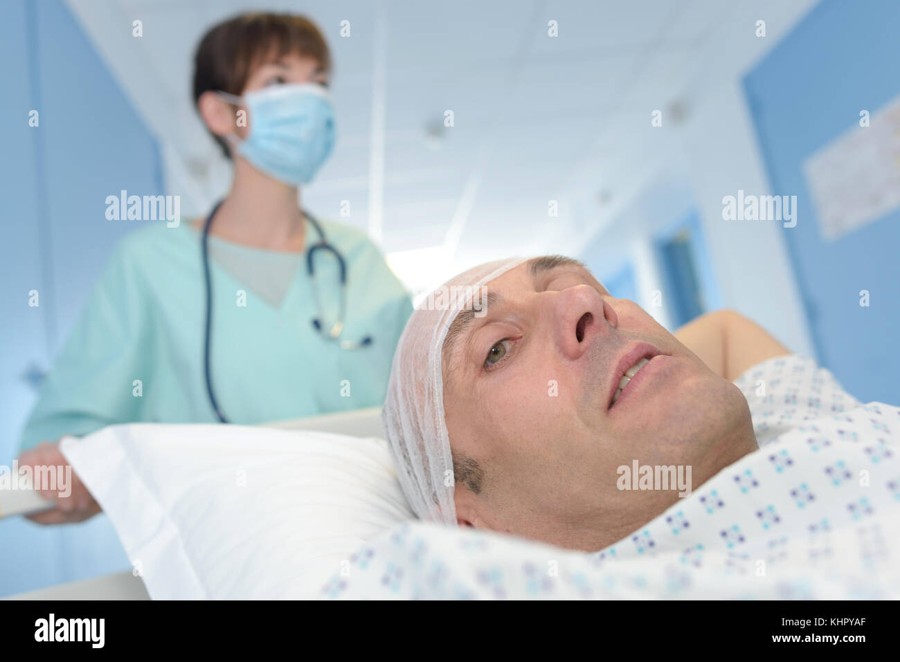 close-up of an injured man on a stretcher Stock Photo - Alamy
